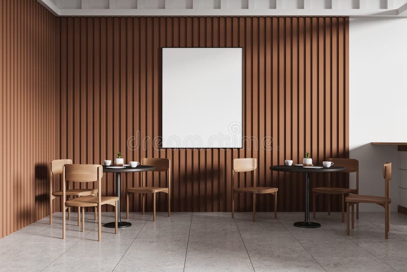 Empty Poster on a Wooden Wall in a Cafe Setting with Tables and Chairs ...