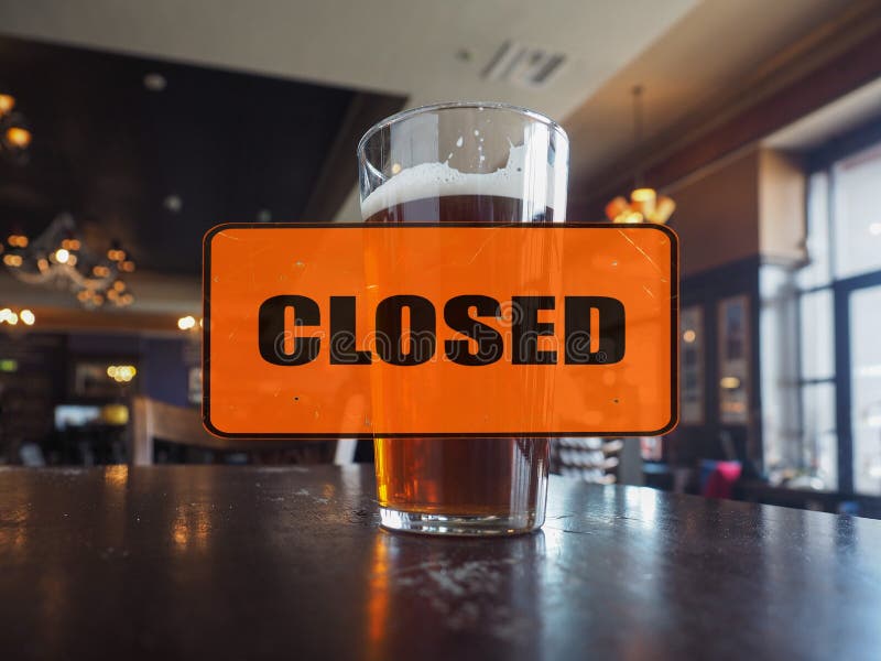 Empty pub with closed sign stock image. Image of virus - 176703401