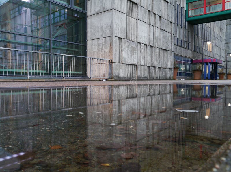 Empty Puddle on Street in City during Autumn Stock Photo - Image of ...