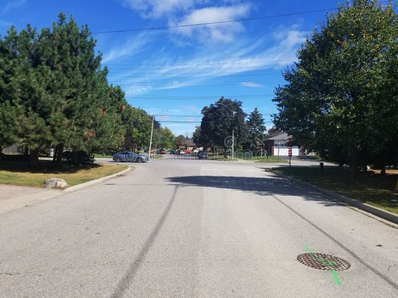 Quiet Neighborhood Under a Blue Clouds Stock Photo - Image of number ...
