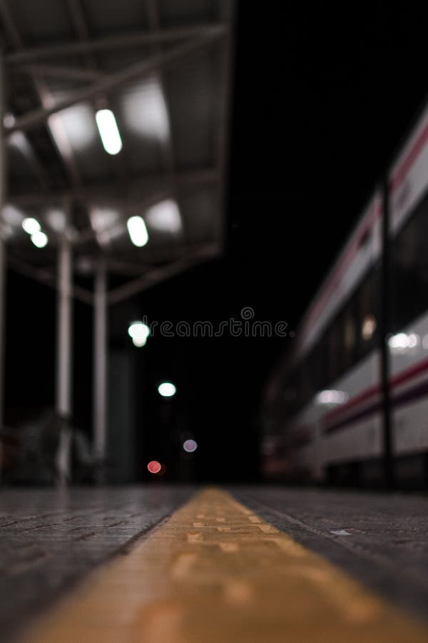 Empty Rail Road Station at Night. the Train is Going on the Tracks ...