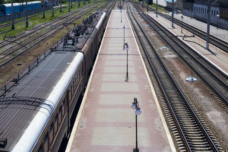 Empty Railway Platform with Electric Train and Railroad Stock Image ...