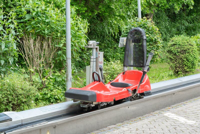 Empty Red Roller Coaster Sled at Track End Stock Image - Image of ...
