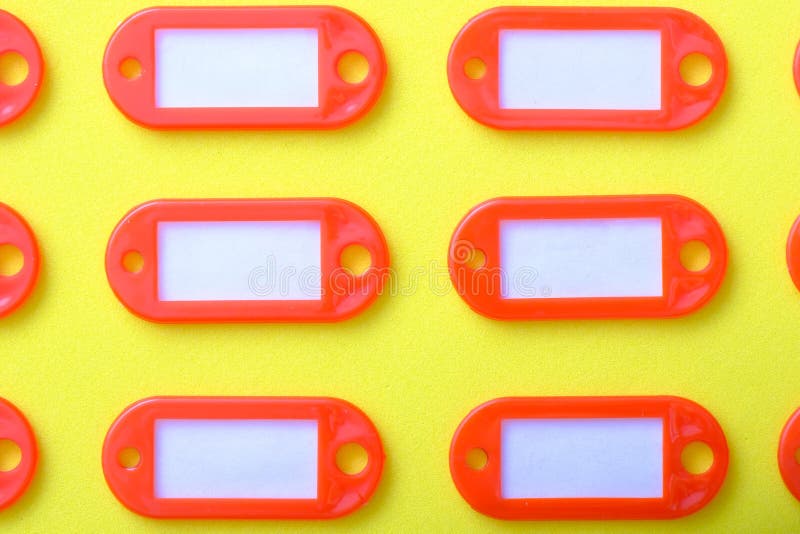 Red Plastic Tags for Numbering Keys in a Red Box Stock Image - Image of ...