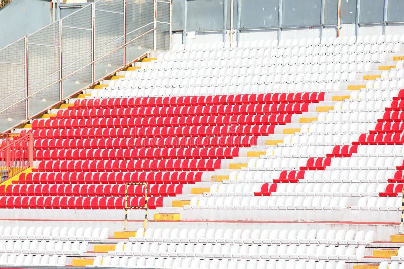 Empty Red and White Seats in the Stadium Stands without People before ...