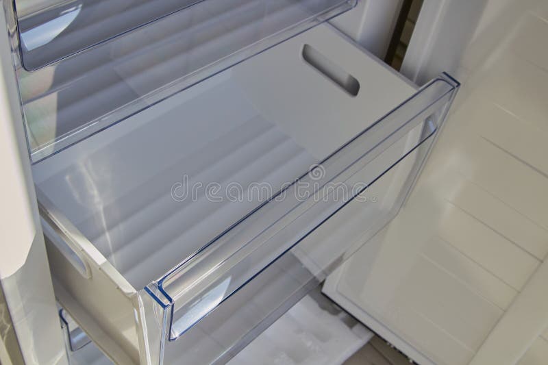 An Empty Refrigerator Drawer, an Open Plastic Box in the Refrigerator ...
