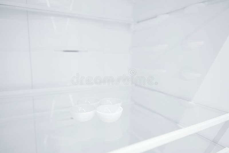 An Empty Refrigerator. Inside an Empty, Clean Refrigerator, a ...