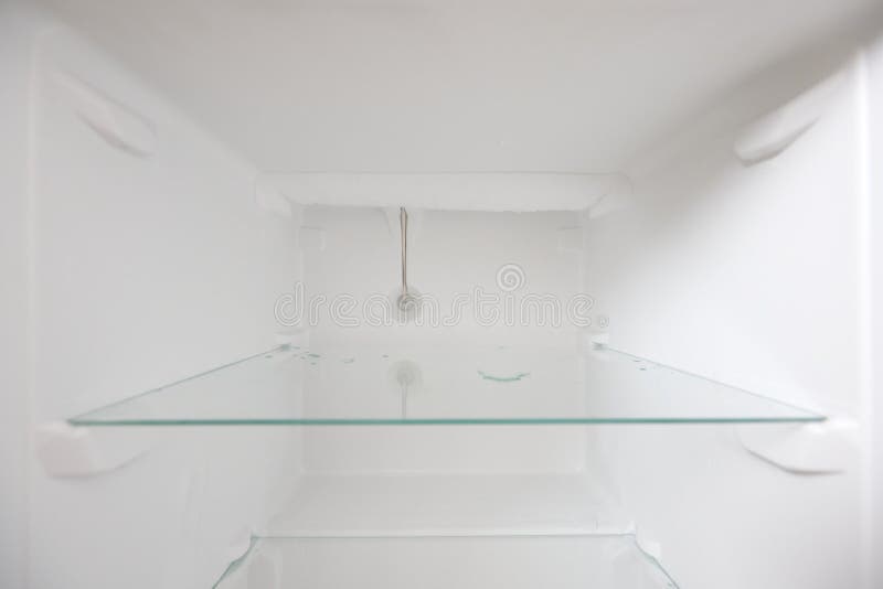 An Empty Refrigerator. Inside an Empty, Clean Refrigerator, a ...
