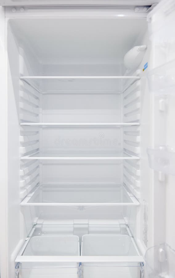 An Empty Refrigerator. Inside an Empty, Clean Refrigerator, a ...