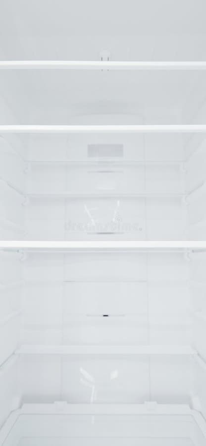 An Empty Refrigerator. Inside an Empty, Clean Refrigerator, a ...