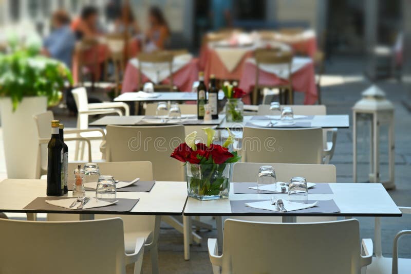 Empty Restaurant Tables Set in the Terrace Waiting Customers for Dinner ...