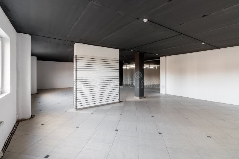 Empty Retail Space with a Black Ceiling and a Dirty Floor, Immediately ... Empty Retail Space with a Black Ceiling and a Dirty Floor, Immediately ...