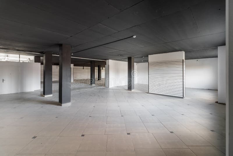 Empty Retail Space with a Black Ceiling and a Dirty Floor, Immediately ... Empty Retail Space with a Black Ceiling and a Dirty Floor, Immediately ...