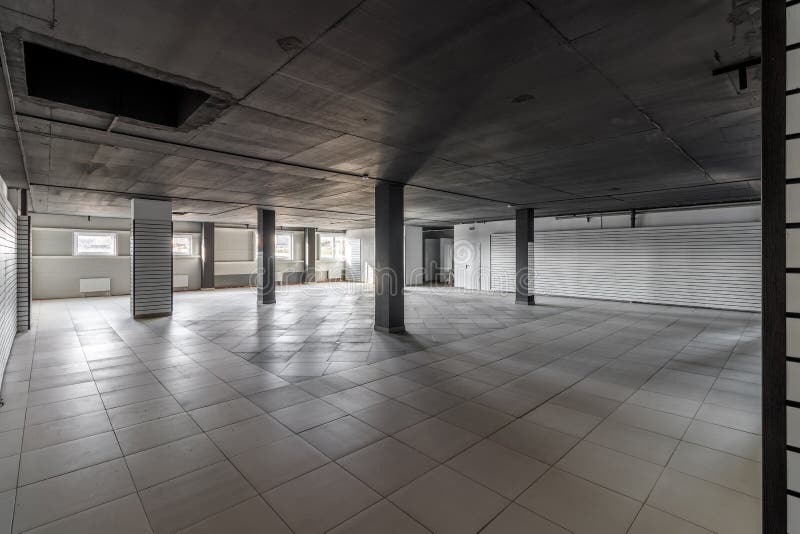 Empty Retail Space with a Black Ceiling and a Dirty Floor, Immediately ... Empty Retail Space with a Black Ceiling and a Dirty Floor, Immediately ...