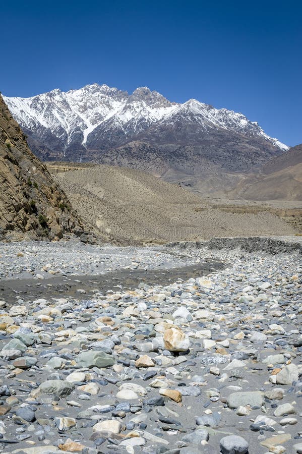 Empty Riverbed with Snow Mountain Stock Photo - Image of china, vast ...