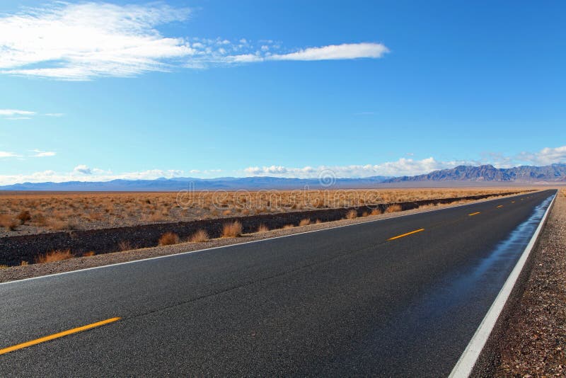 Straight, flat empty road stock photo. Image of asphalt - 1024888