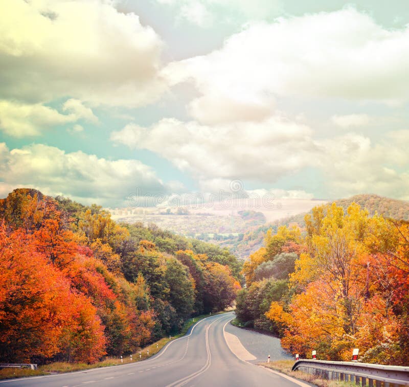 Empty Road in Autumn Forest Against Blue Sky Stock Photo - Image of ...