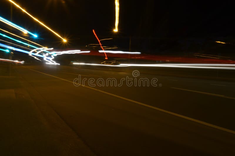 Empty Road Illuminated by Lights at Night Stock Image - Image of travel ...