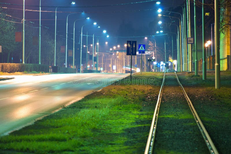 Empty road at night stock image. Image of building, loneliness - 22904839