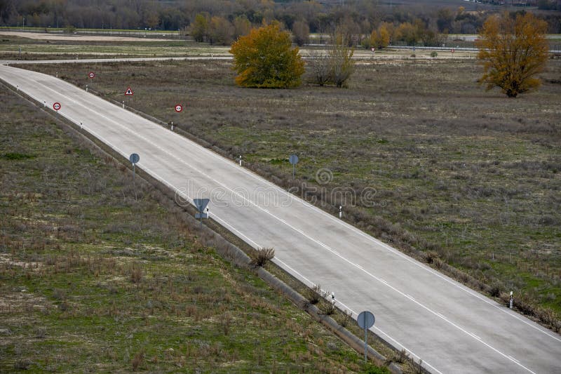 An Empty Road with One Lane in Each Direction Circulating Stock Photo ...
