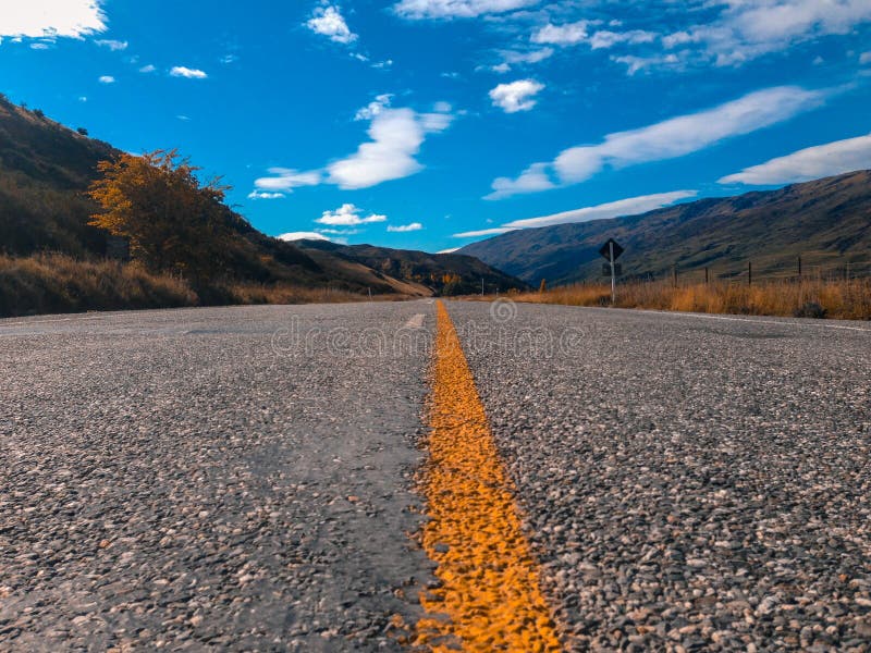 Empty Road and Scenic Landscape in New Zealand, Low Angle View Stock ...
