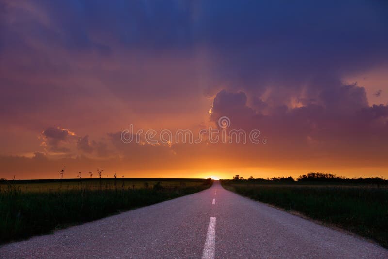 Empty road at sunset. stock photo. Image of rays, perspective - 31427188
