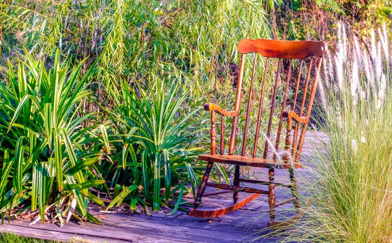 Empty Rocking Chair in Garden at Summer Sunset Stock Image - Image of ...