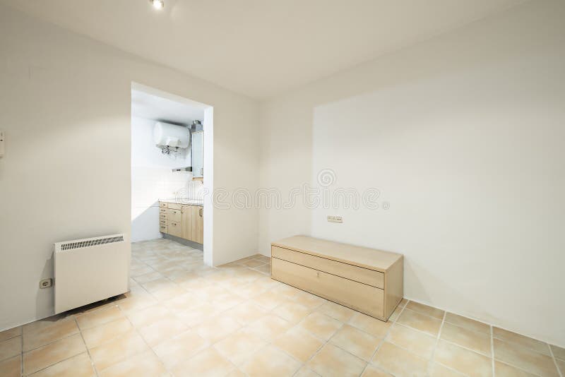 Empty Room with Access To a Kitchen without Doors and Electric Heat ...