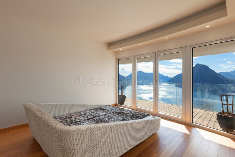 Empty room with a bed stock photo. Image of sliding, parquet - 69566124