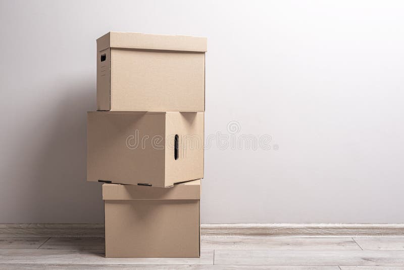 Empty Room with Cardboard Boxes. Stock Photo - Image of pile, real ...