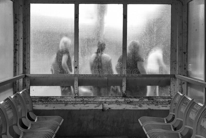 Empty Room with Chairs and People Standing Behind the Window in Black ...