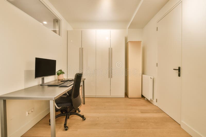 A Home Office with a Desk and a Computer Stock Image - Image of desk ...