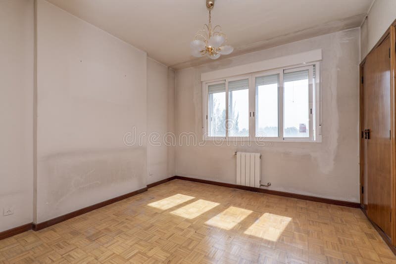 Empty Room with Fitted Wardrobes on One Side and Double Stock Photo ...