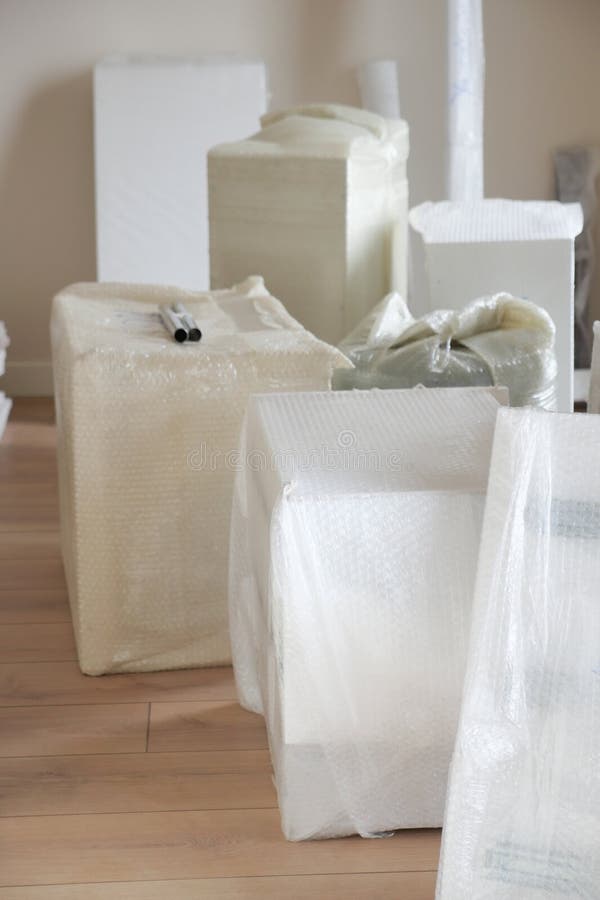 An Empty Room with Hardwood Flooring and Wrapped in Plastic. Stock ...