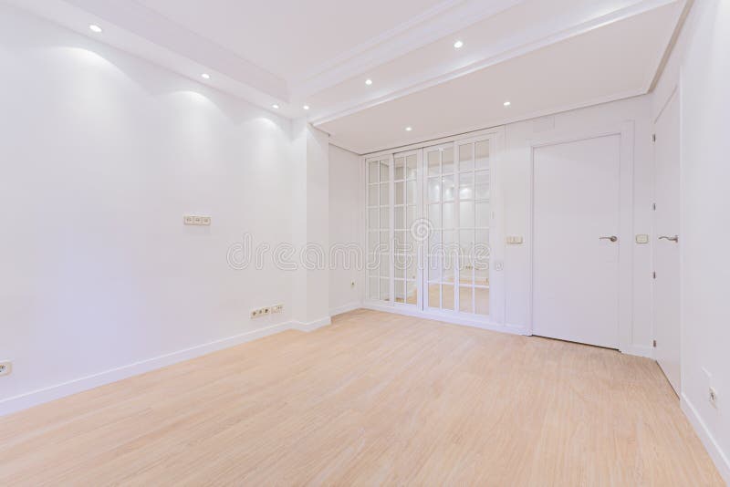 Empty Room with Laminated Flooring, Wardrobe with Sliding Mirror Doors ...