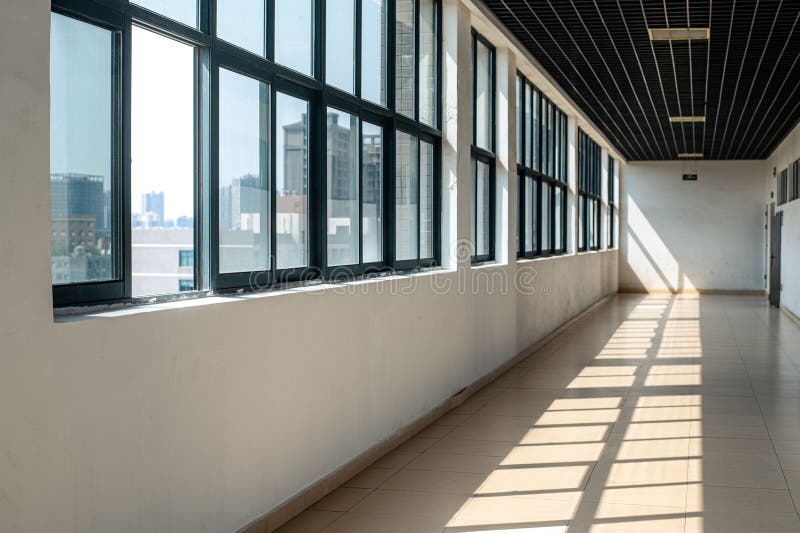Empty Room with Large Windows and Pristine White Walls Stock Photo ...