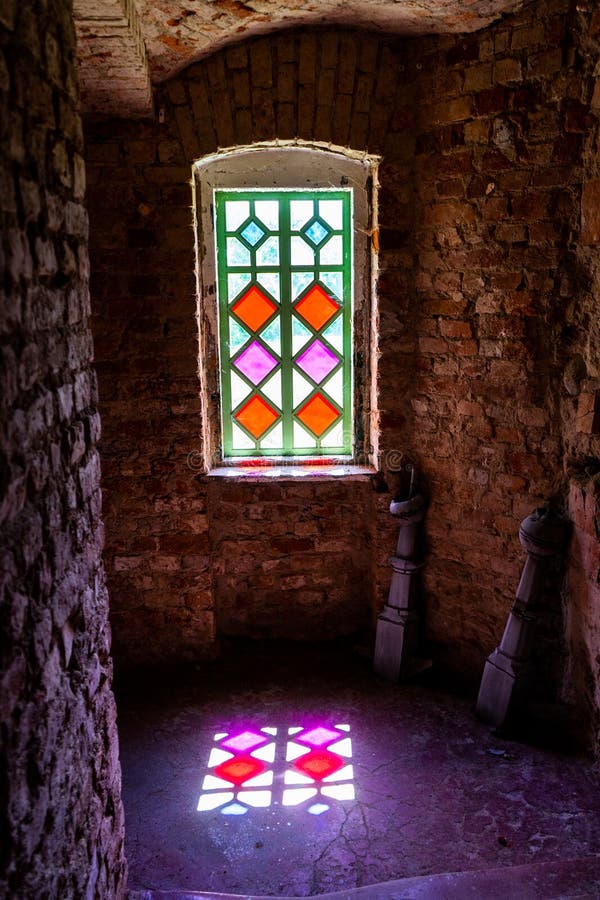 An Empty Room with Light Coming through Multicolored Stained Glass ...