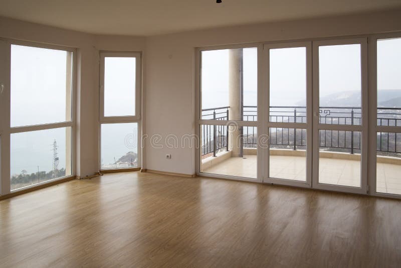 Modern Empty Room with Windows in Floor and City View Stock Photo ...
