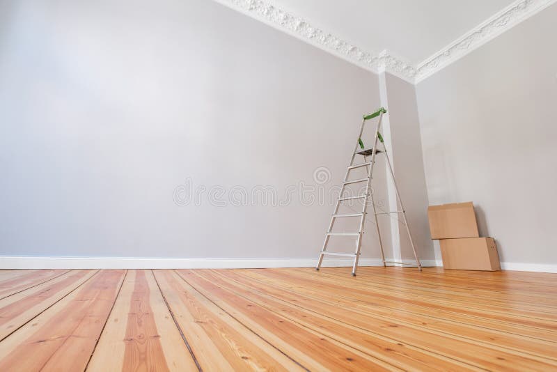 Empty Room after Renovation with Ladder and Cardboard Boxes Stock Photo ...