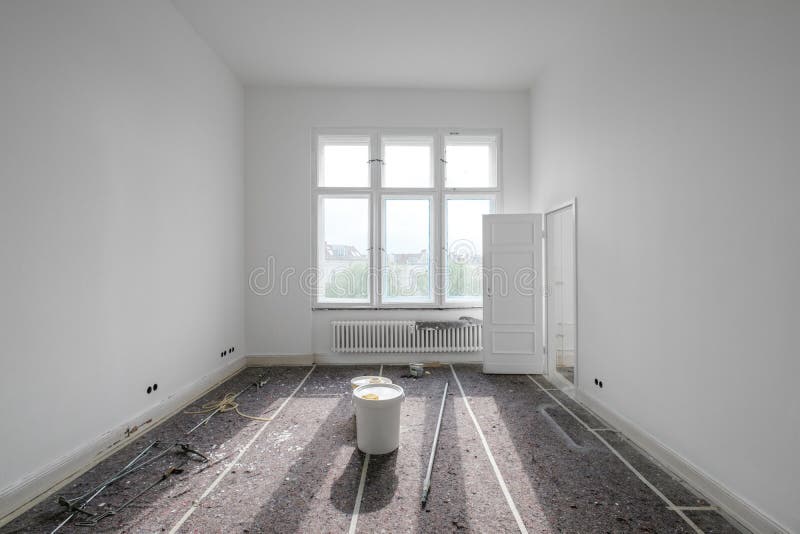 Empty Room during Renovation with Paint Bucket Stock Photo - Image of ...