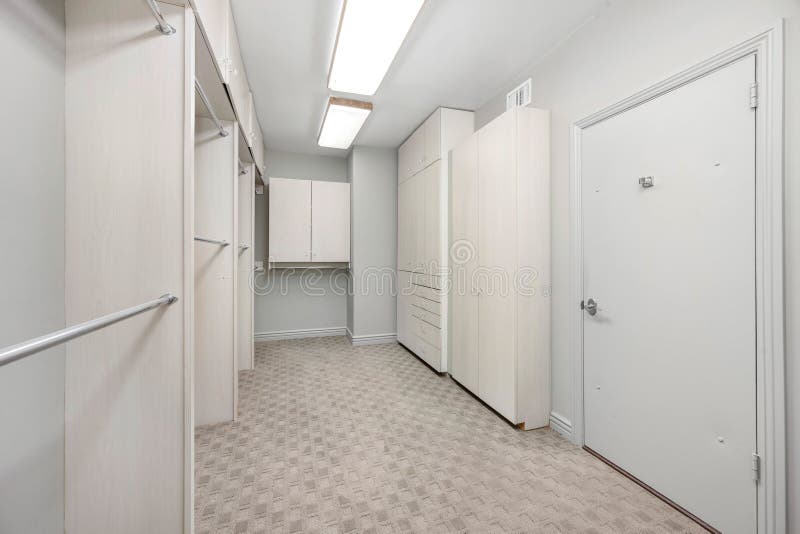 Empty Room with a Single Overhead Light and a Closed Door in Encino ...