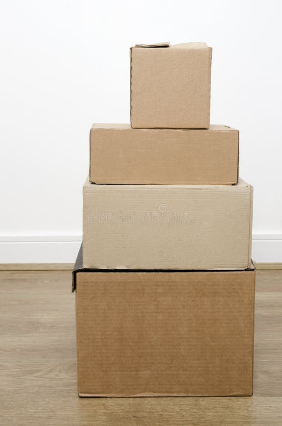 Empty Room with Stack of Cartons: Moving House Concept. Moving in ...