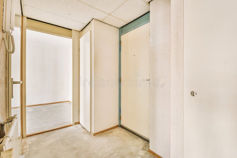 An Empty Room with Three Doors in the Wall Stock Photo - Image of ...