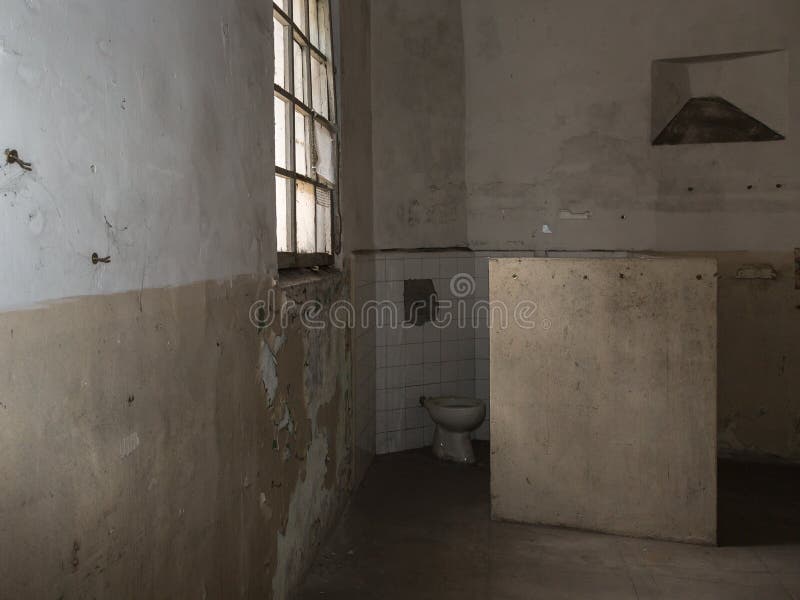 Empty Room with a Toilet in an Old Prison Editorial Stock Image - Image ...