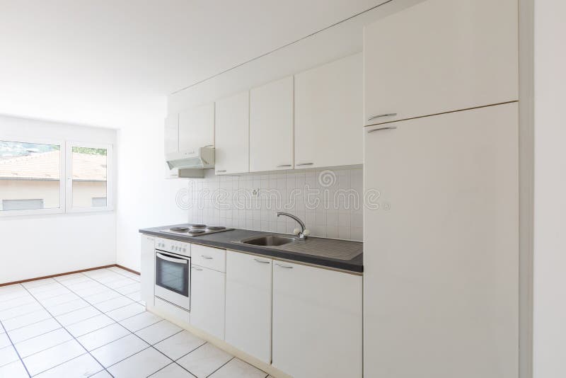 Empty Room with Vintage Kitchen, White Tiles and Walls Stock Image ...
