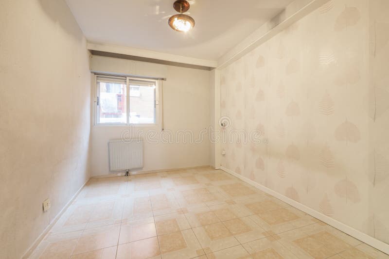 Empty Room with Wallpapered Wall with Tiled Floors and Simple Aluminum ...