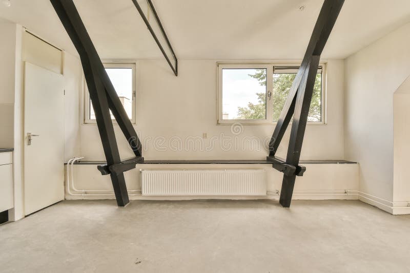 An Empty Room with Two Windows and a White Door Stock Photo - Image of ...