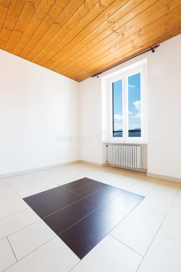 Empty Room with Wooden Ceiling and Grey Tiles Stock Photo - Image of ...