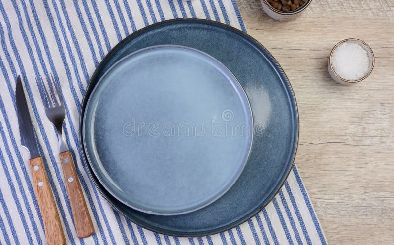 Empty Round Ceramic Plate on the Table with Spices, Top View Stock ...