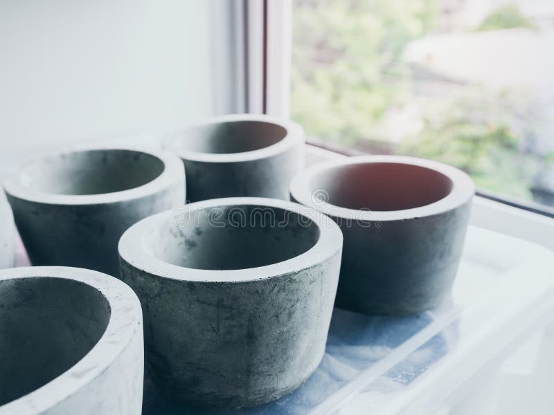 Empty round concrete pots stock photo. Image of decoration - 191042472